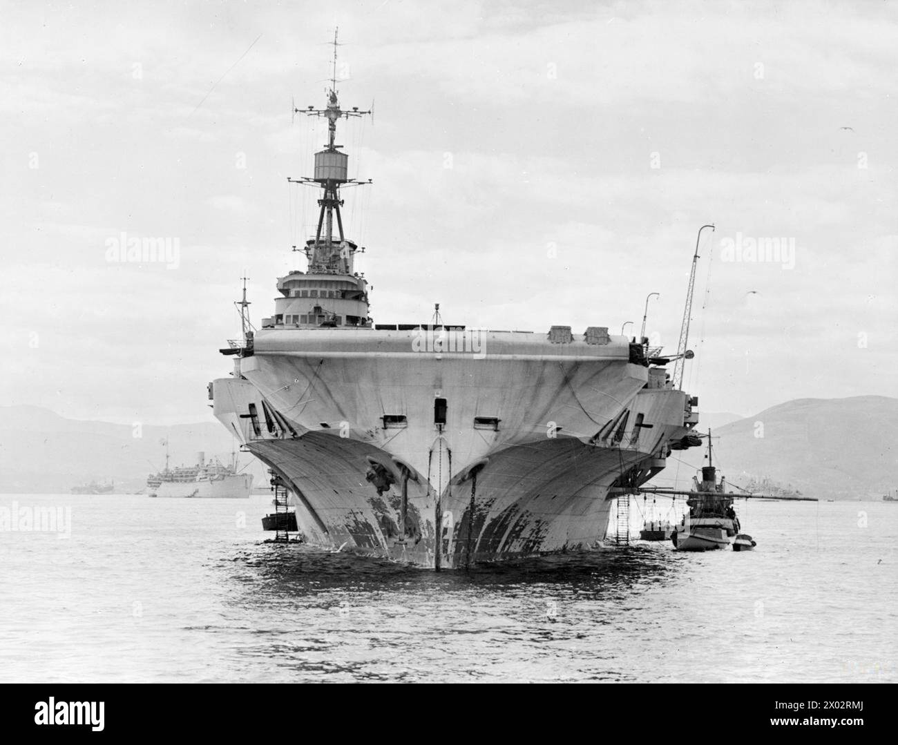 THE AIRCRAFT CARRIER HMS IMPLACABLE, AT ANCHOR. 21 AUGUST 1944 ...