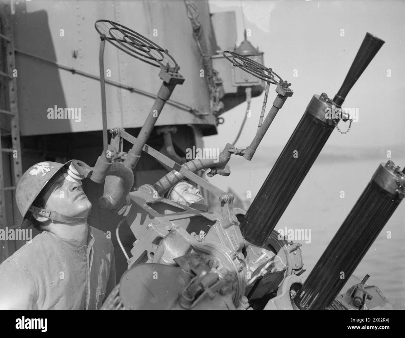 Polish Navy sailors operate twin Vickers .50 (12.7 mm) Mk III anti ...