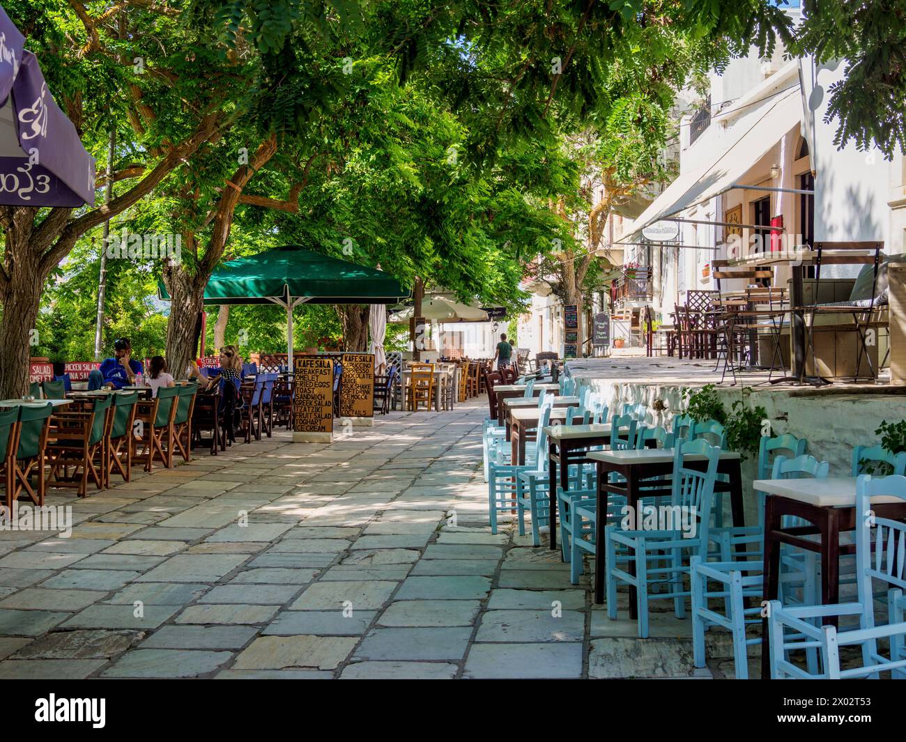 Street of Apeiranthos Village and cafe tables, Naxos Island, Cyclades ...
