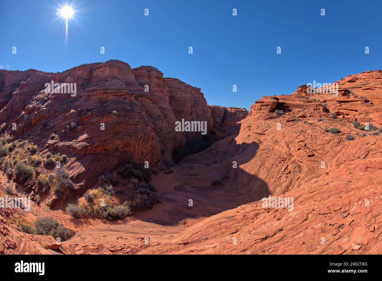 A dry waterfall of wavy sandstone in the spur canyon just north of the ...