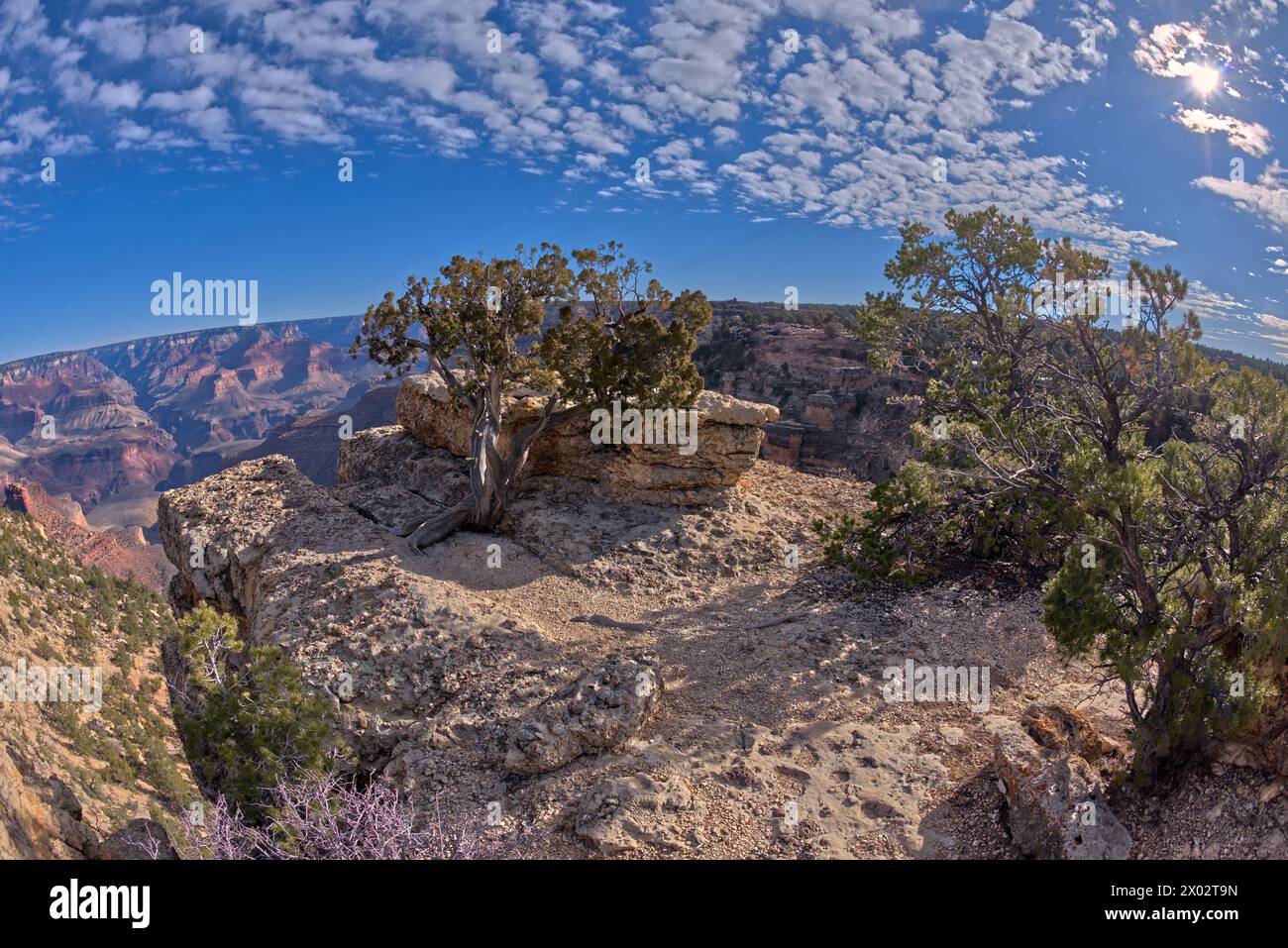 An outcrop of rock overlooking the Bright Angel Trail below at Grand ...