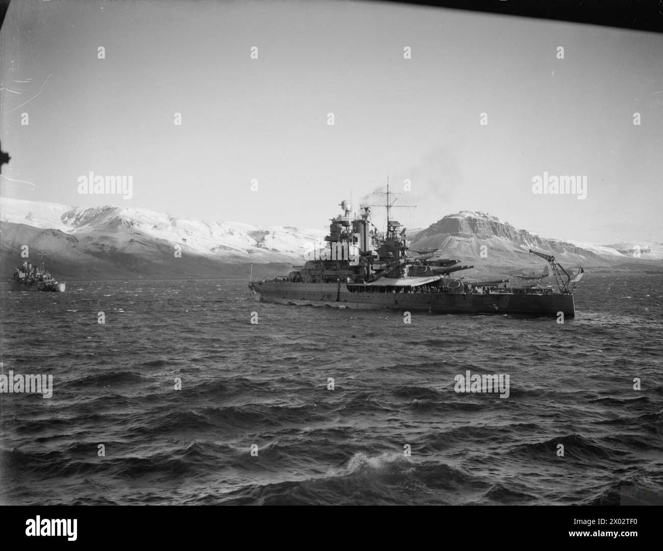 USS Mississippi is shown at anchor in Hvalfjord, Iceland in November ...