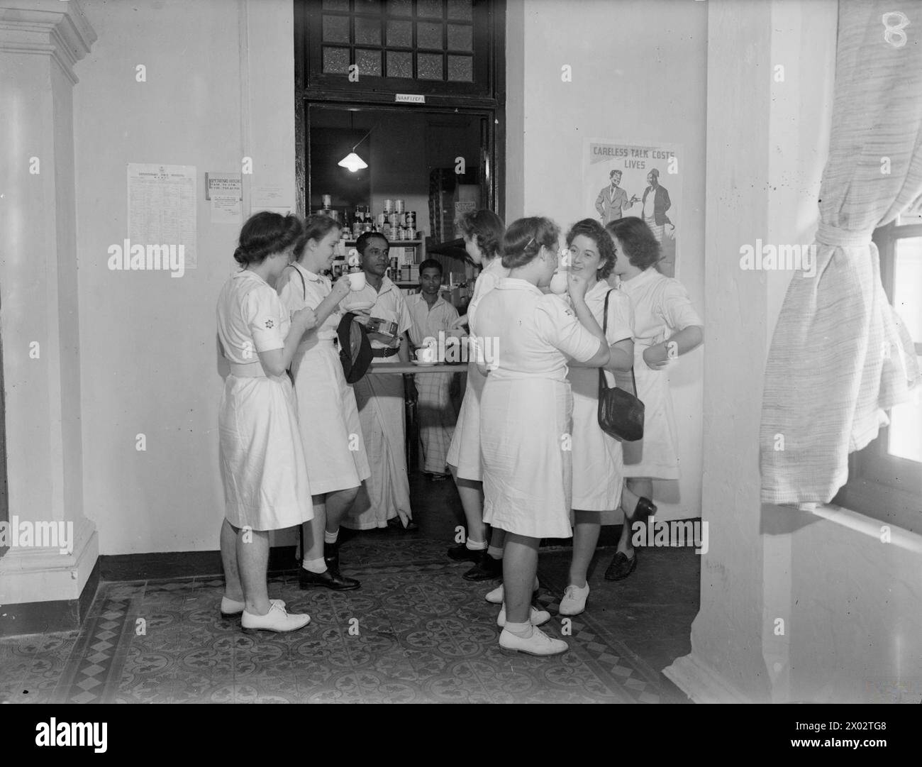 WRNS personnel are pictured in the canteen of their quarters in Ceylon ...