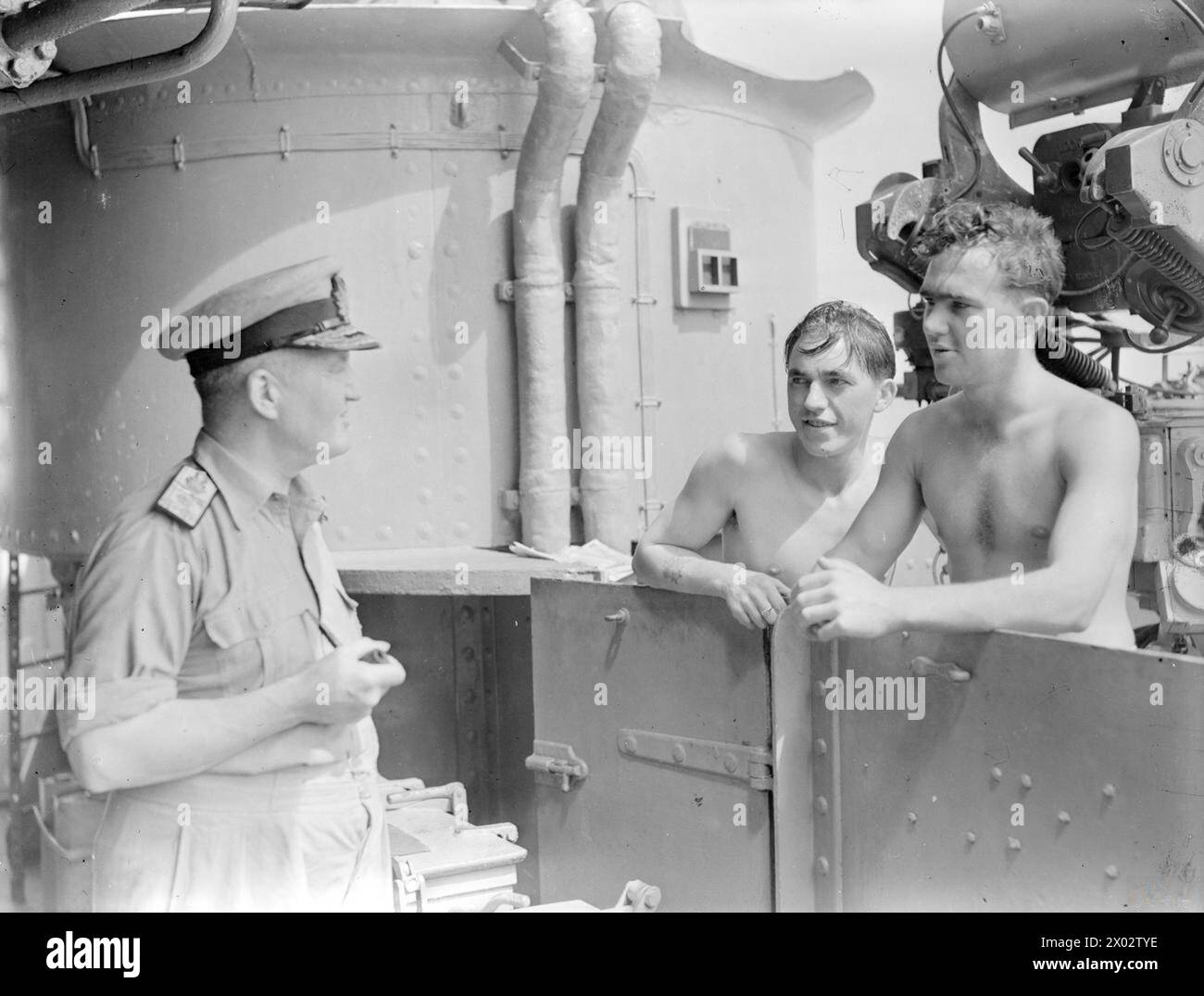 In August 1945, British Pacific Fleet personnel, including Admiral Sir ...