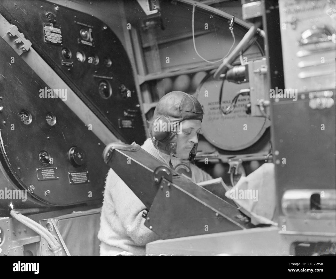 The wireless operator aboard a Short Sunderland flying boat logs a ...