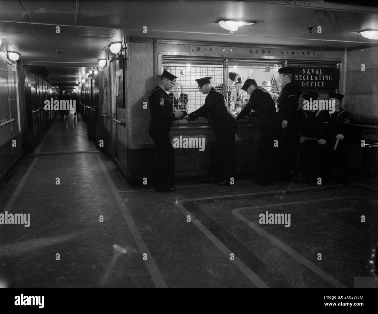 On 28 September 1944, the 84,000-ton liner Queen Mary in war paint ...