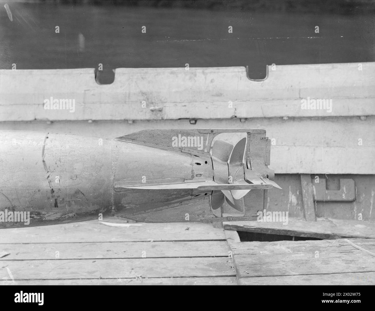 TORPEDOS. 6 AUGUST 1942. - The tail of a torpedo, seen from the side ...