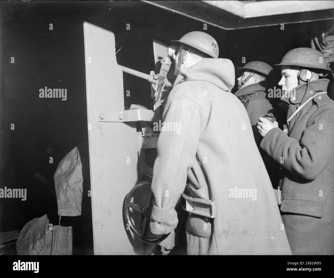 On board HMS Rodney in October 1940, the searchlight control operator ...