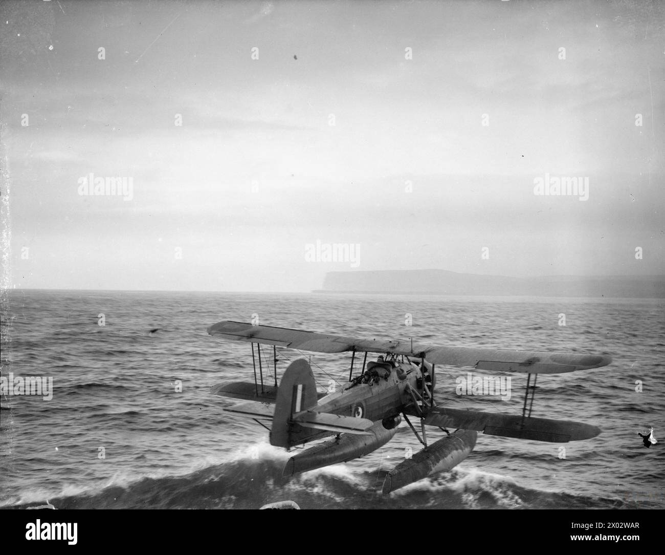 ON BOARD HMS MALAYA. OCTOBER 1941. - A Fairey Swordfish sea plane ...