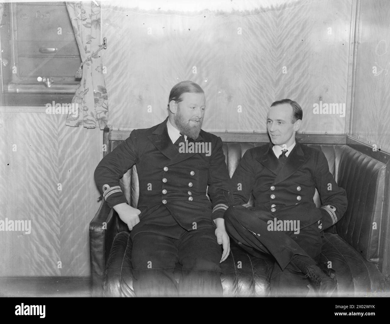 HM SUBMARINE THUNDERBOLT, FORMERLY HMS THETIS, ON HER RETURN TO HARBOUR ...