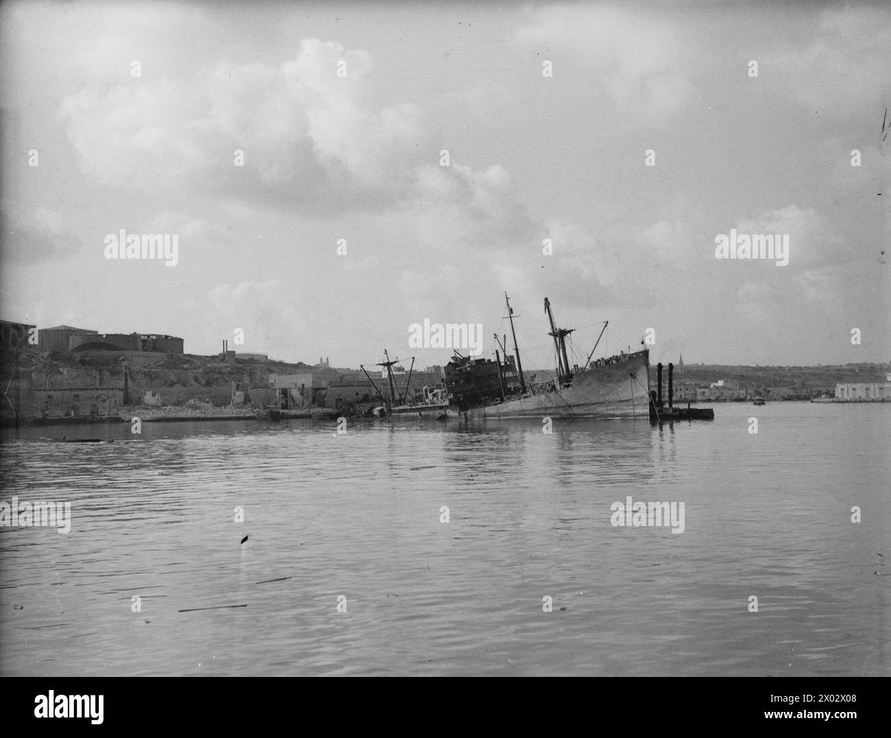 BOMB DAMAGE IN MALTA. APRIL 1942, DAMAGE TO HMS ST ANGELO AT MALTA AND ...