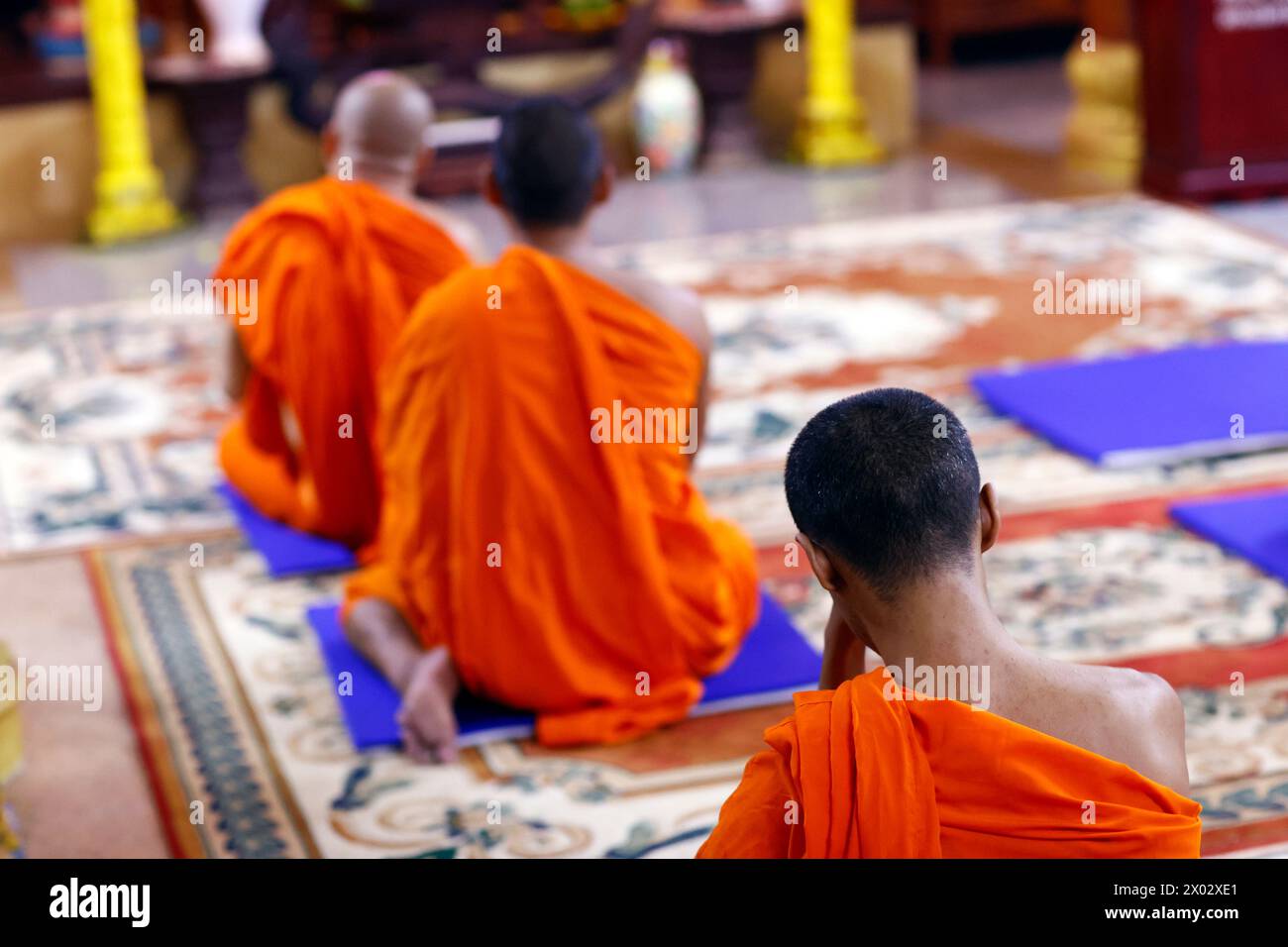 Buddhist monks praying to the Buddha, Munirensay Buddhist Temple, Can ...
