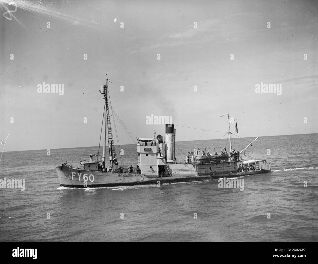 THE CEYLON RNVR ON WAR SERVICE. 1942, COLOMBO, CEYLON. OFFICERS AND MEN ...