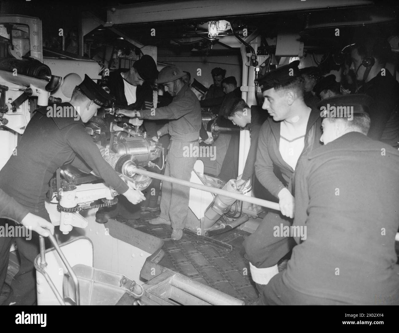 ARMY TROOPS EMBARKED IN THE CRUISER HMS MANCHESTER. JULY 1941. - At ...