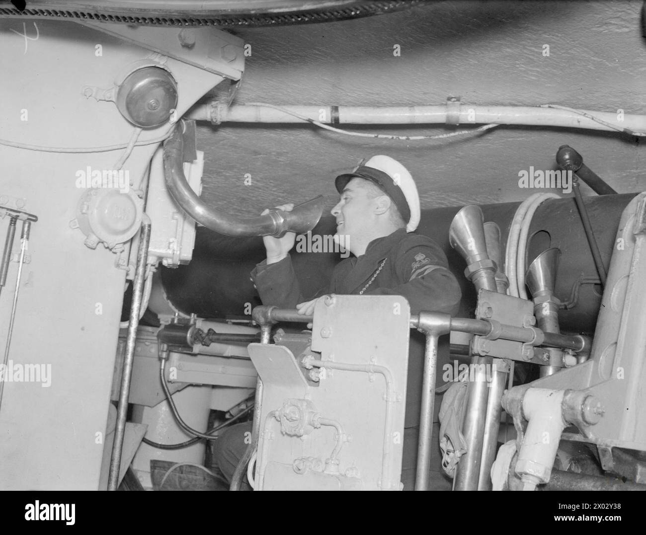 Aboard HMS Rodney in July 1943, officers and crew performed their ...