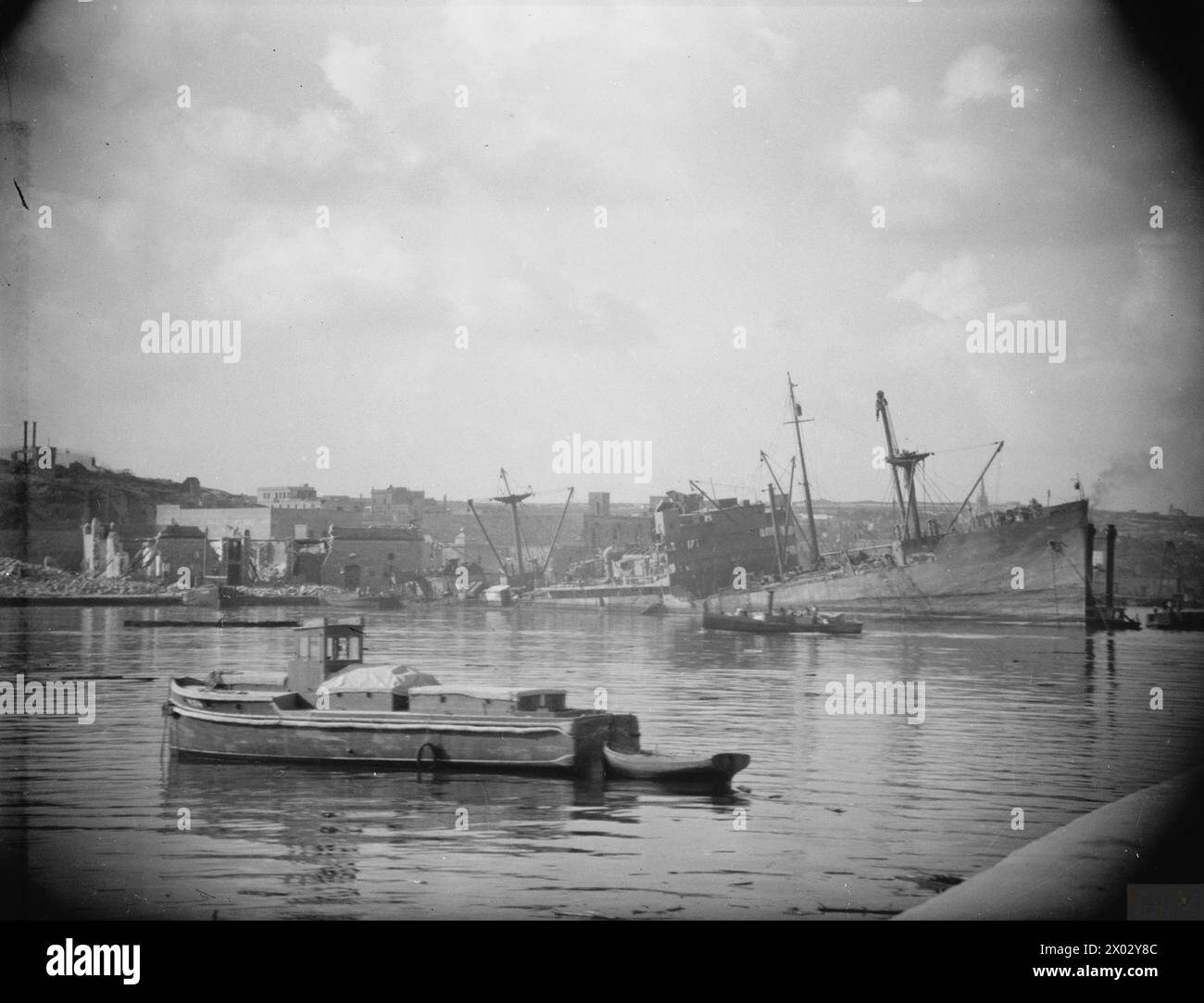 In April 1942, HMS St Angelo and ships in the Malta dockyard and ...