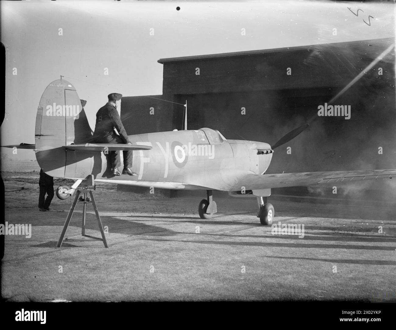 RAF airmen hold down the tail of Supermarine Spitfire Mark I N3072 of ...