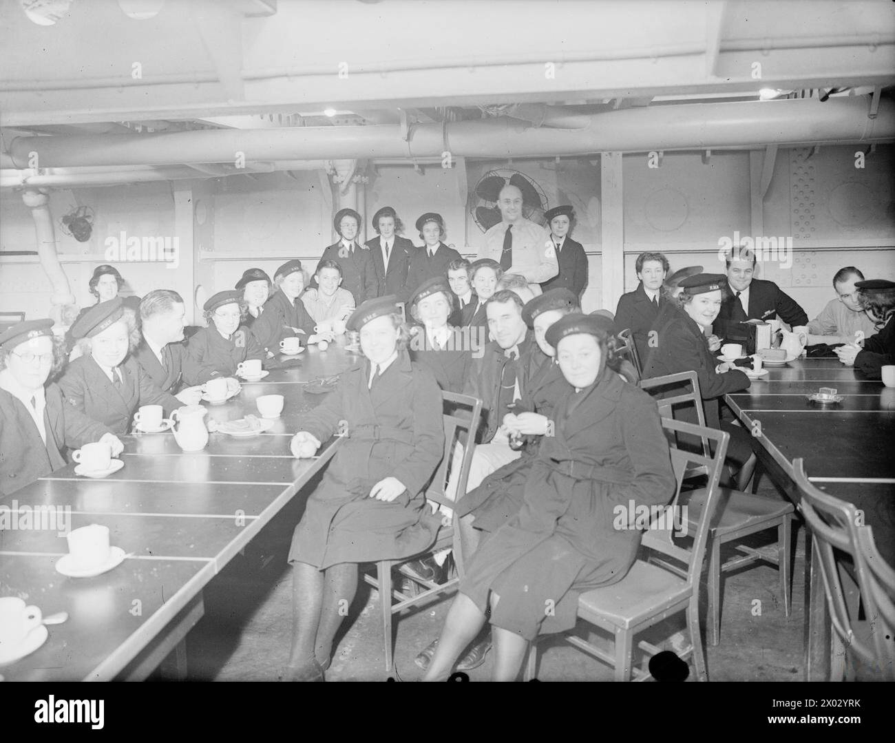 A group of WRENS visit the US Navy aircraft carrier Ranger at Rosyth on ...