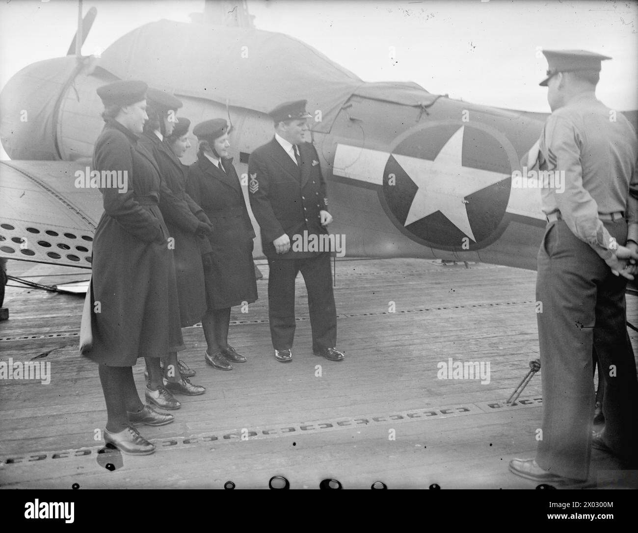 WRENS VISIT US CARRIER. 1 NOVEMBER 1943, ROSYTH. A PARTY OF WRENS PAID ...