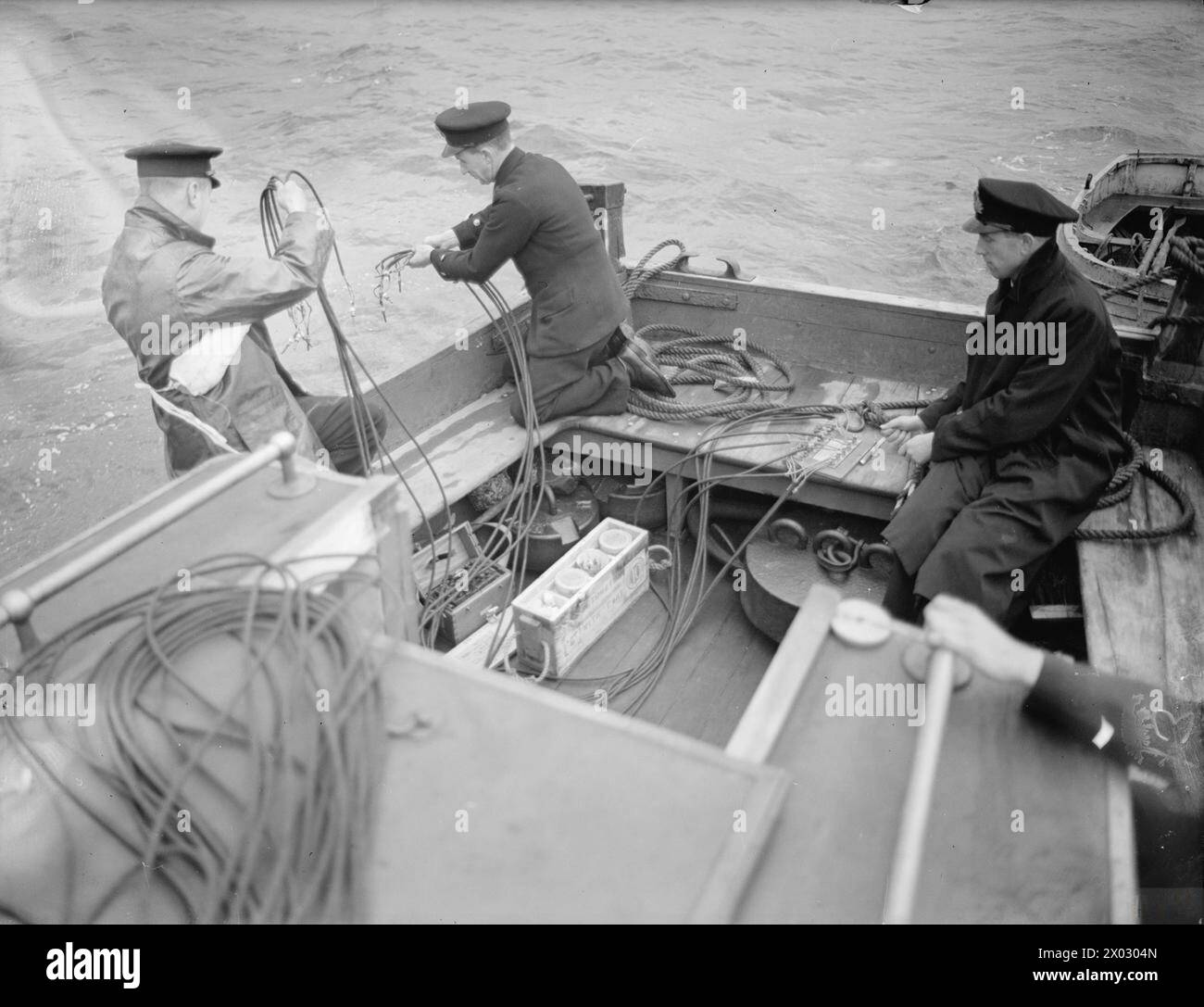 EXPLORING FOR AN ACOUSTIC MINE WITH SMALL EXPLOSIVE CHARGES. 1940, ON ...
