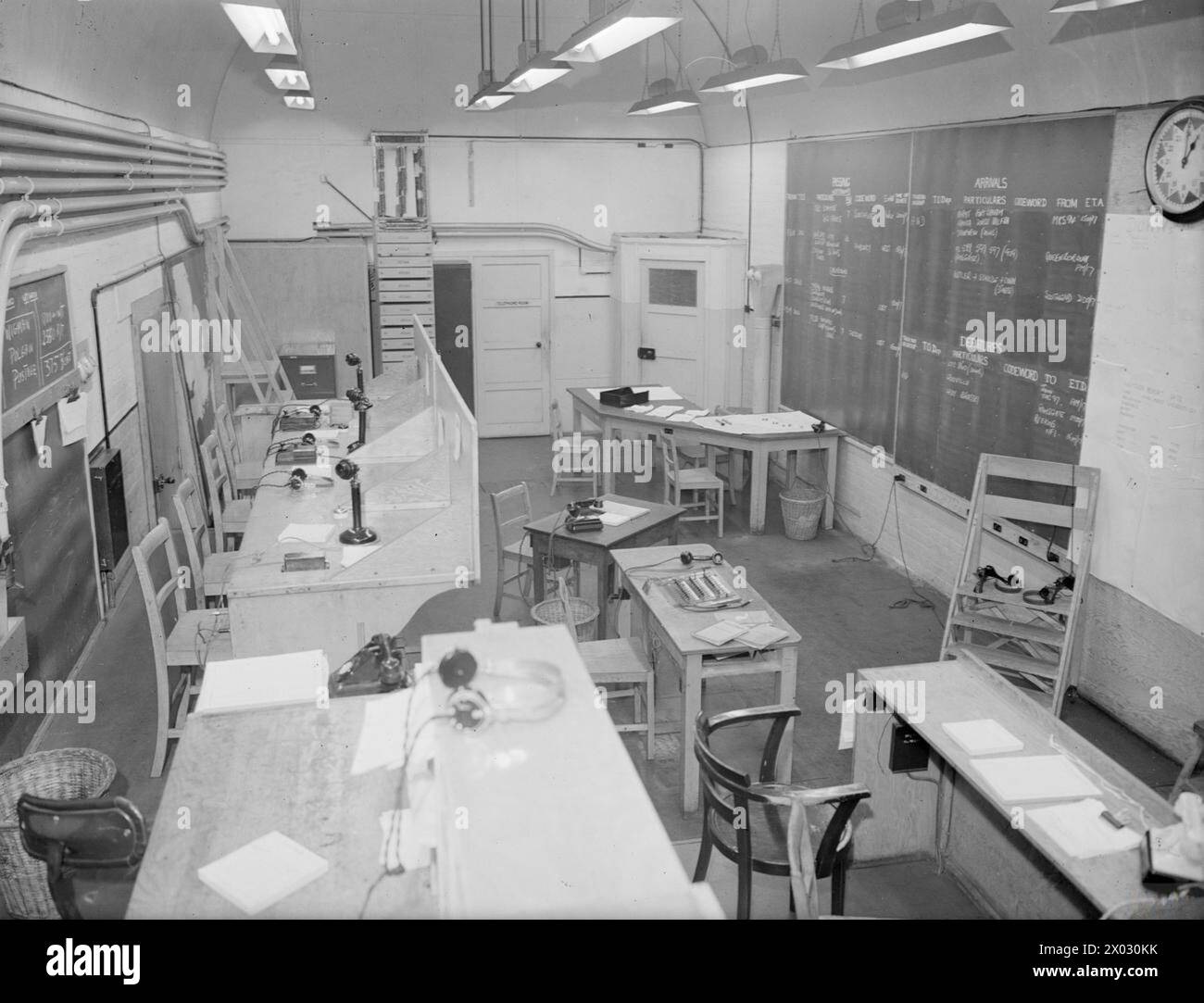 NAVAL PLOTTING AT DOVER. 17 APRIL 1945. - A scene in one of the ...