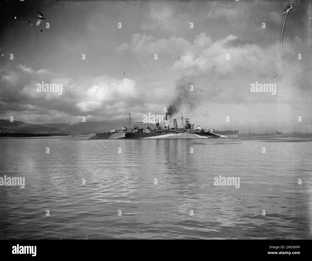 In October 1941, HMS Kent was at anchor while HMS Malaya was on station ...