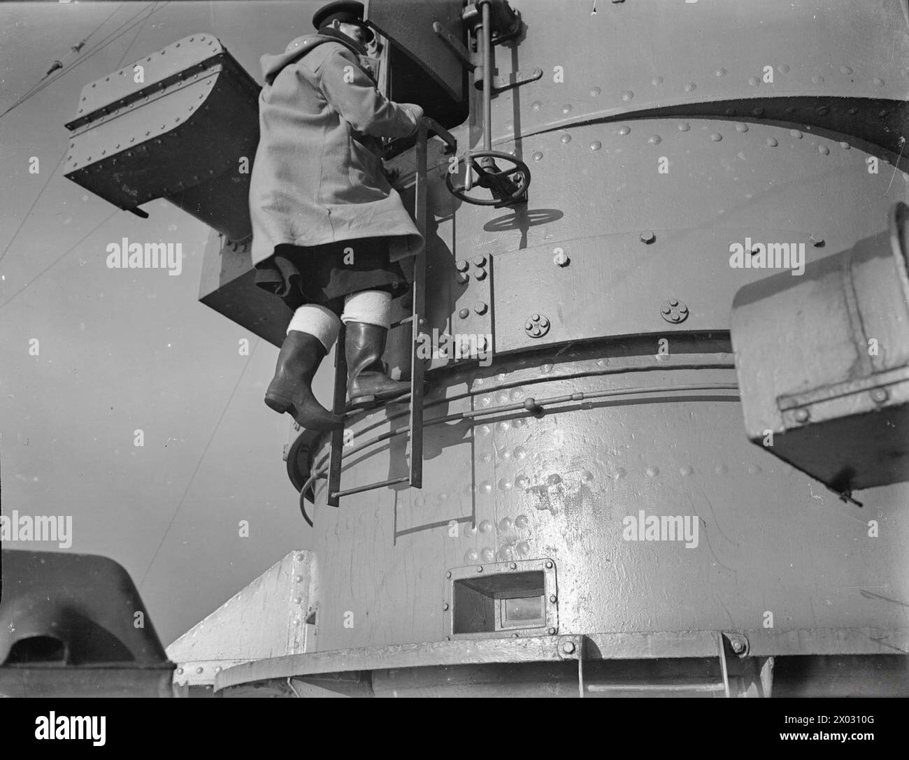 In 1940 aboard HMS Rodney, a Petty Officer climbed into the 16-inch ...