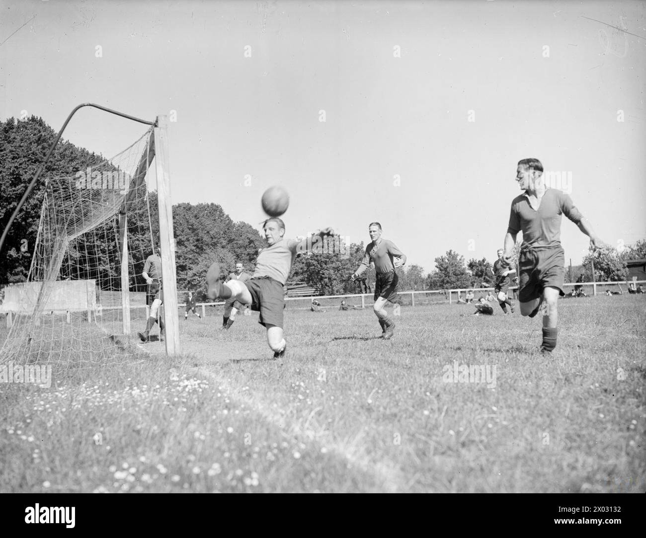 NAVY FOOTBALL MATCH ON HITLER YOUTH FOOTBALL GROUND. MAY 1945, KIEL ...