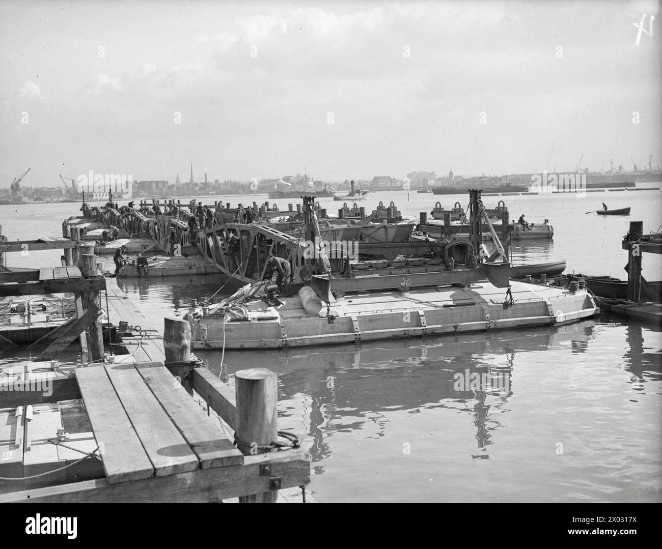 MULBERRY HARBOUR. APRIL 1944, SOUTHAMPTON. TWO HUGE PREFABRICATED ...