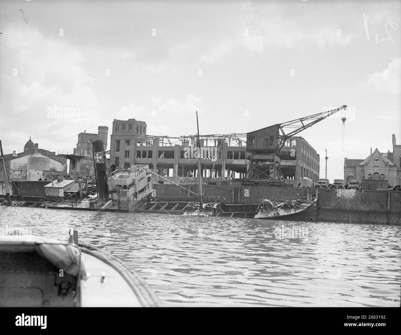 WRECKAGE IN THE BOMB-SCARRED HAMBURG DOCKS. 8 JULY 1945, WRECKED AND ...