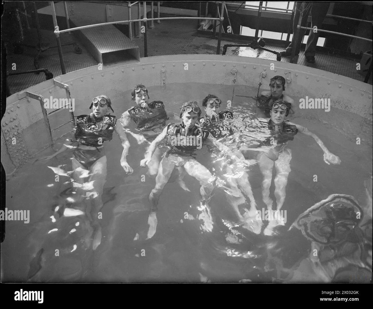 Submarine trainees at HMS Dolphin, Gosport, use Davis apparatus in an ...