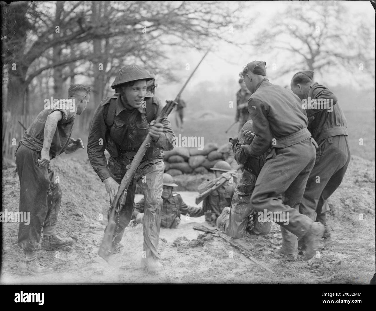 THE BRITISH ARMY IN THE UNITED KINGDOM 1939-45 - A soldier emerges from ...