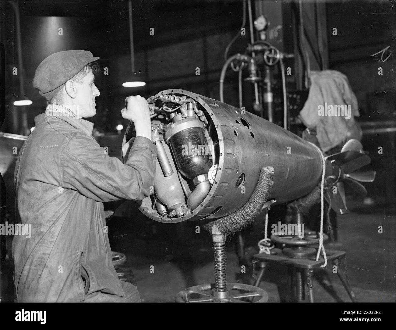 At Rosyth Naval Torpedo Depot in 1940 or 1941, a workman installed a ...