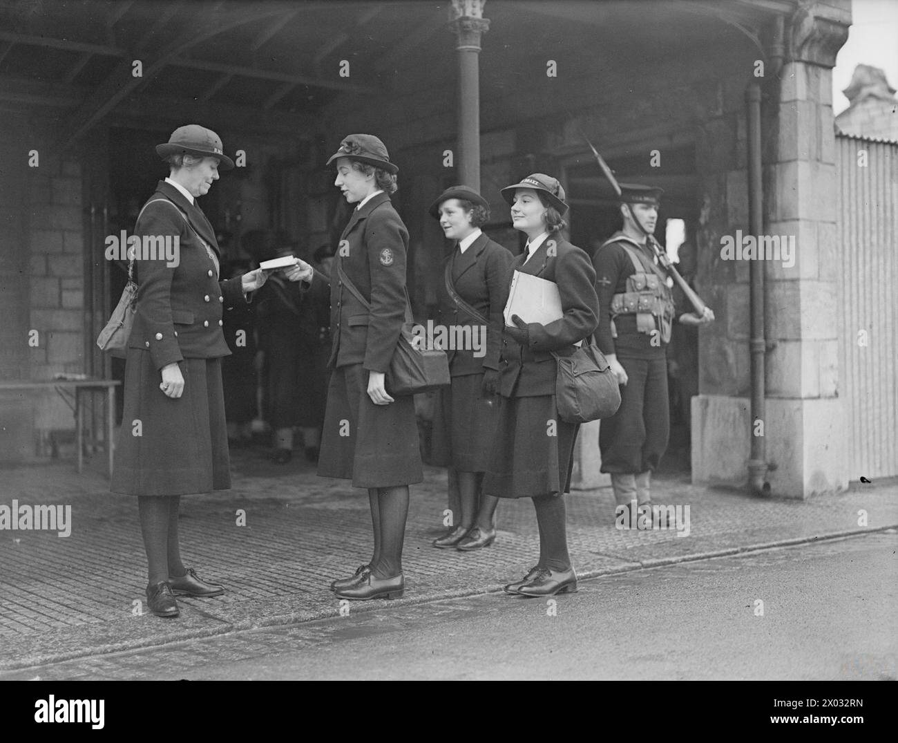WRNS AT WORK. 1940, AT A ROYAL NAVY BARRACKS. - Regulating Wren at ...