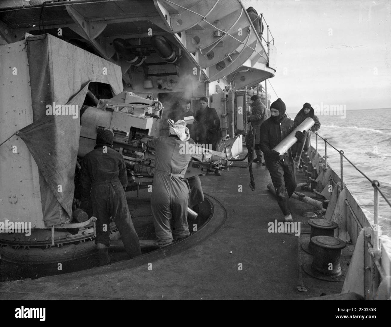 GUNNERS IN ACTION ON BOARD THE DESTROYER HMS FURY. 11 AND 20 FEBRUARY ...