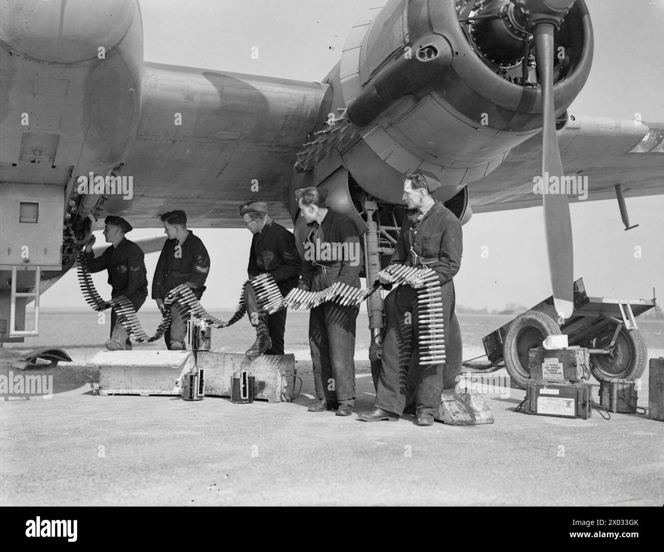 ROYAL AIR FORCE FIGHTER COMMAND, 1939-1945. - RAF armourers loading ...