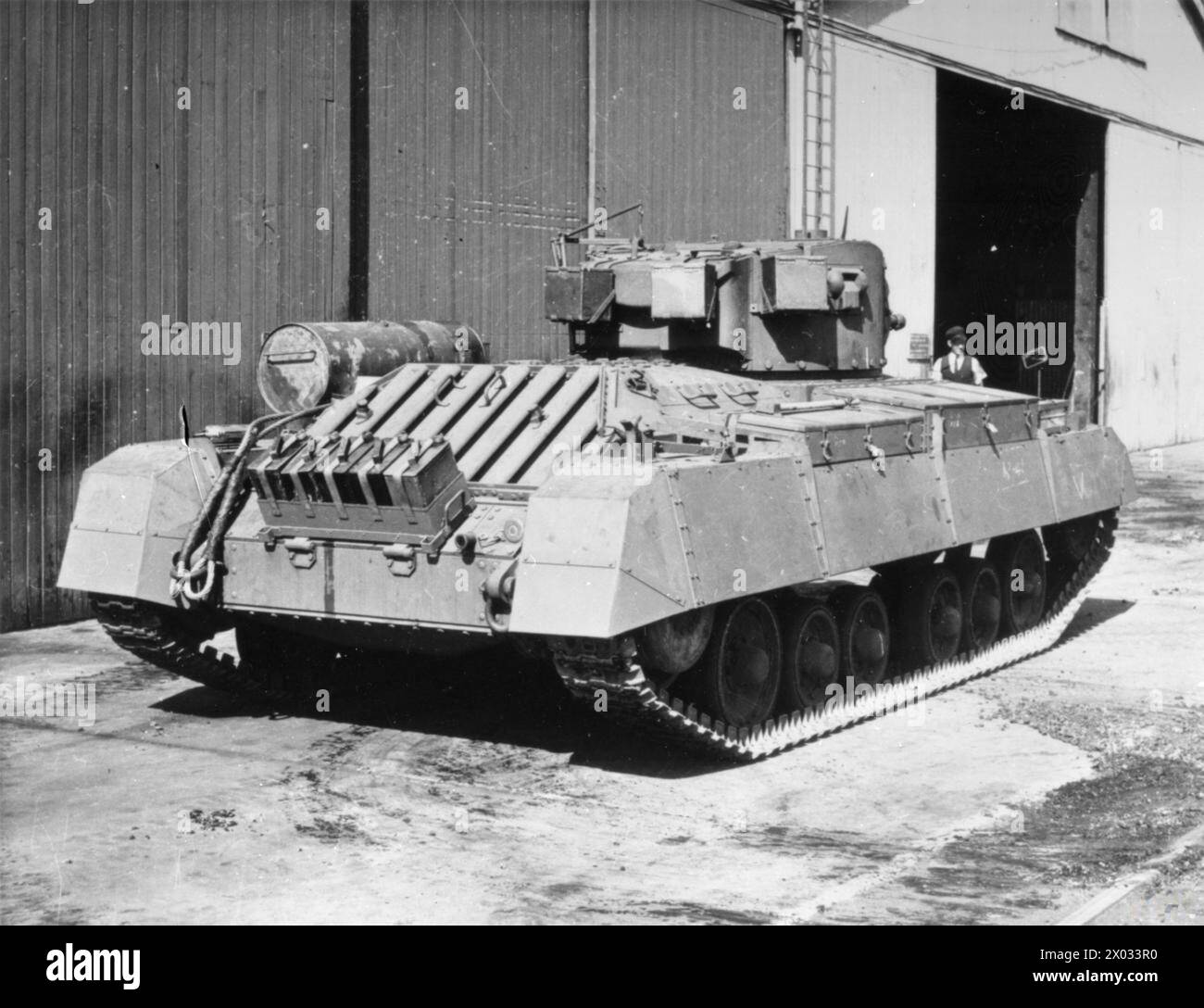 Valentine Mk.II tank with sand skirts and auxiliary fuel tanks, viewed ...