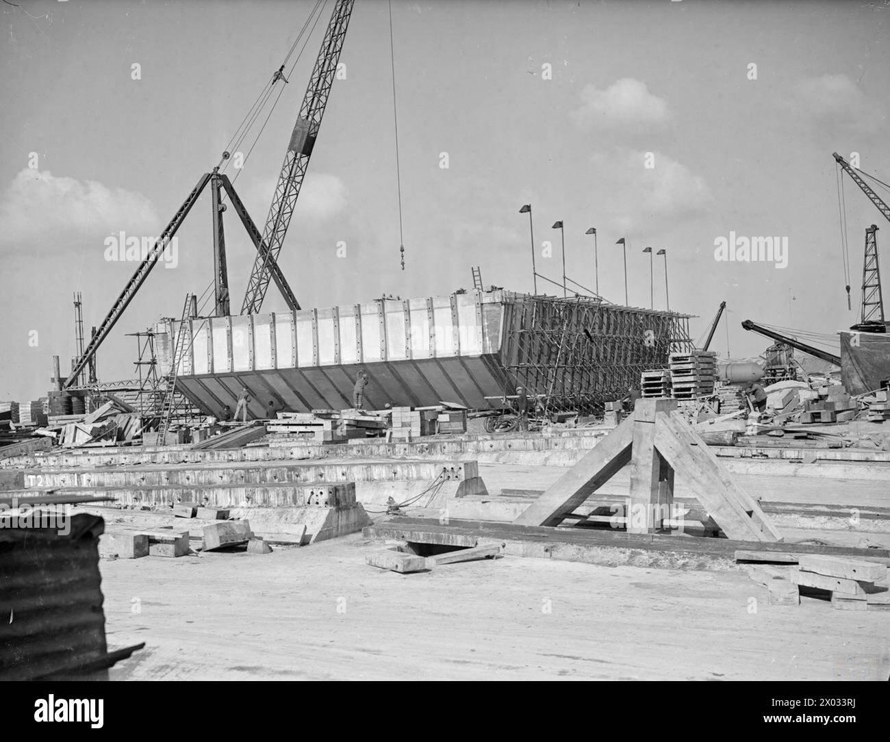 MULBERRY HARBOUR. APRIL 1944, SOUTHAMPTON. TWO HUGE PREFABRICATED ...