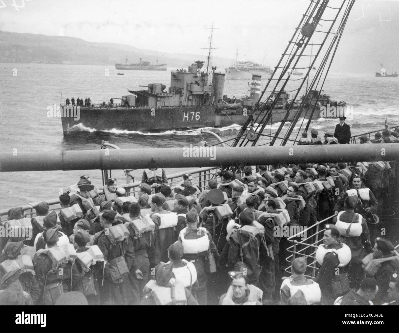 THE ROYAL NAVY DURING THE SECOND WORLD WAR - HMS FURY passing troops at ...