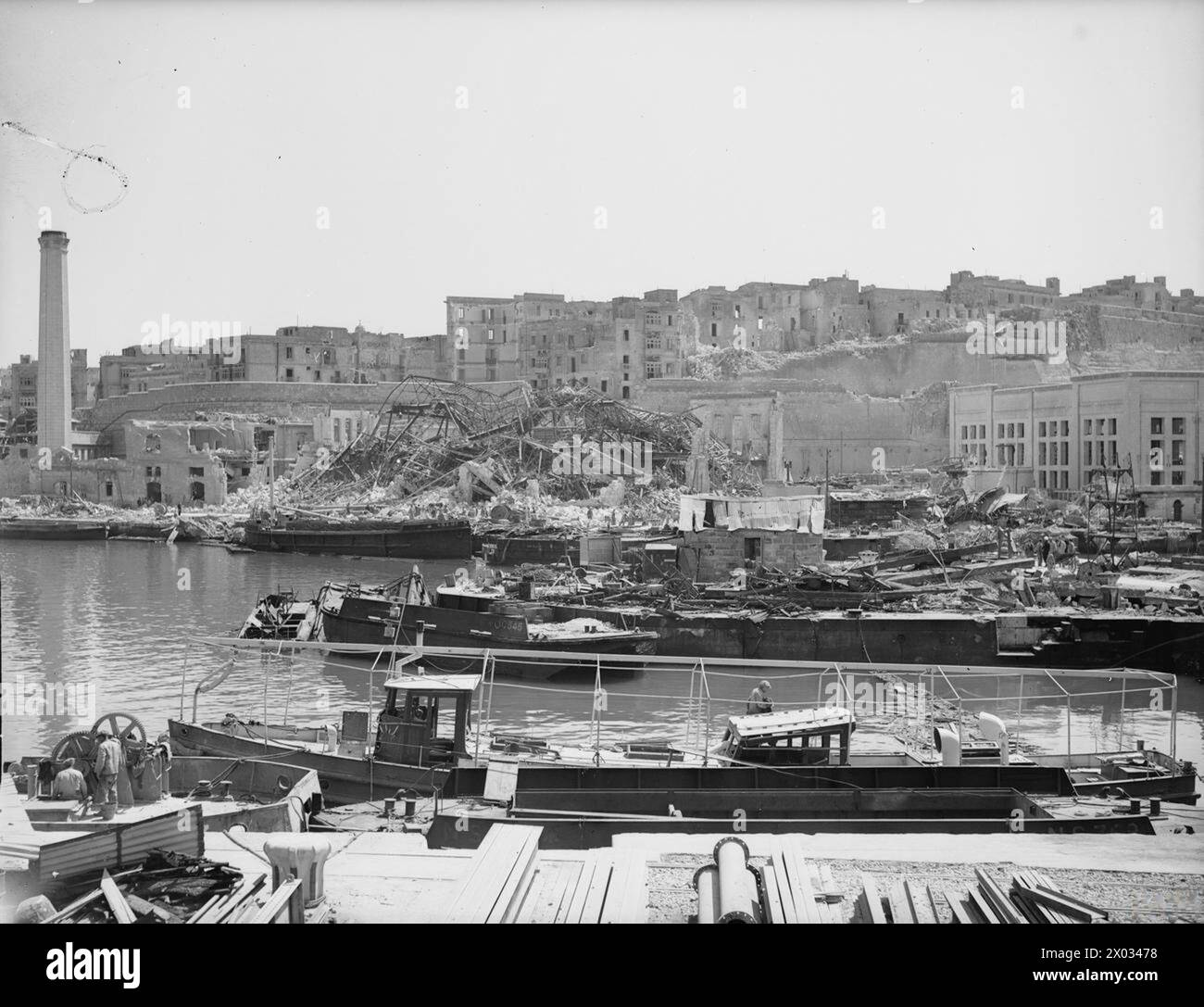 BOMB DAMAGE IN MALTA AFTER BIGGEST RAID YET. 7 APRIL 1942. BOMB DAMAGE ...
