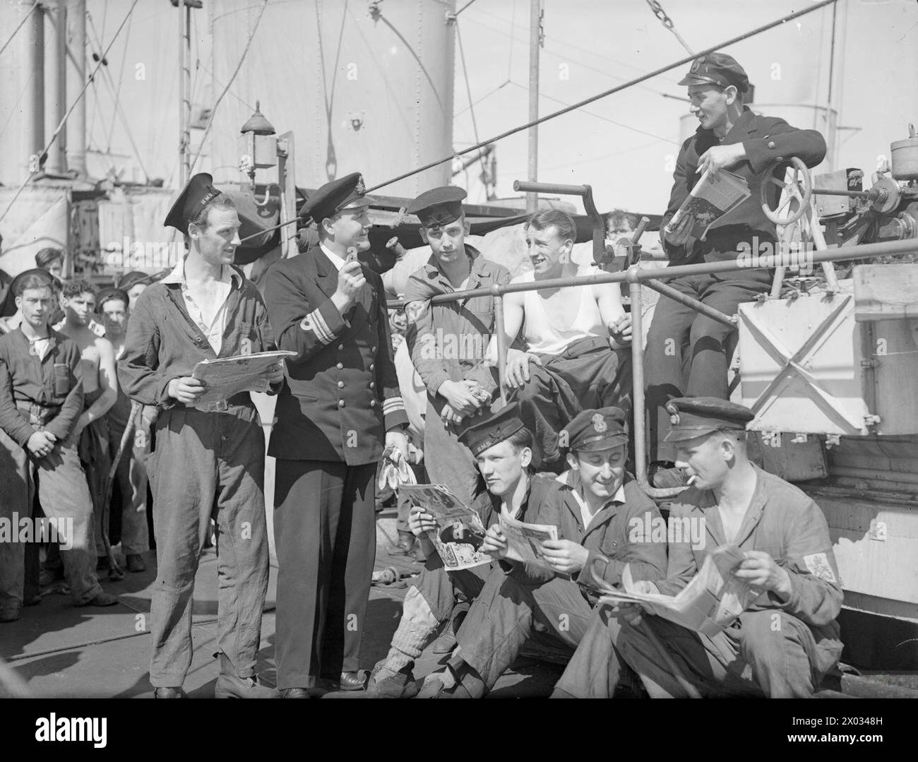 ESKIMO BACK AFTER GETTING A U-BOAT. 27 JUNE 1944, PLYMOUTH. OFFICERS ...