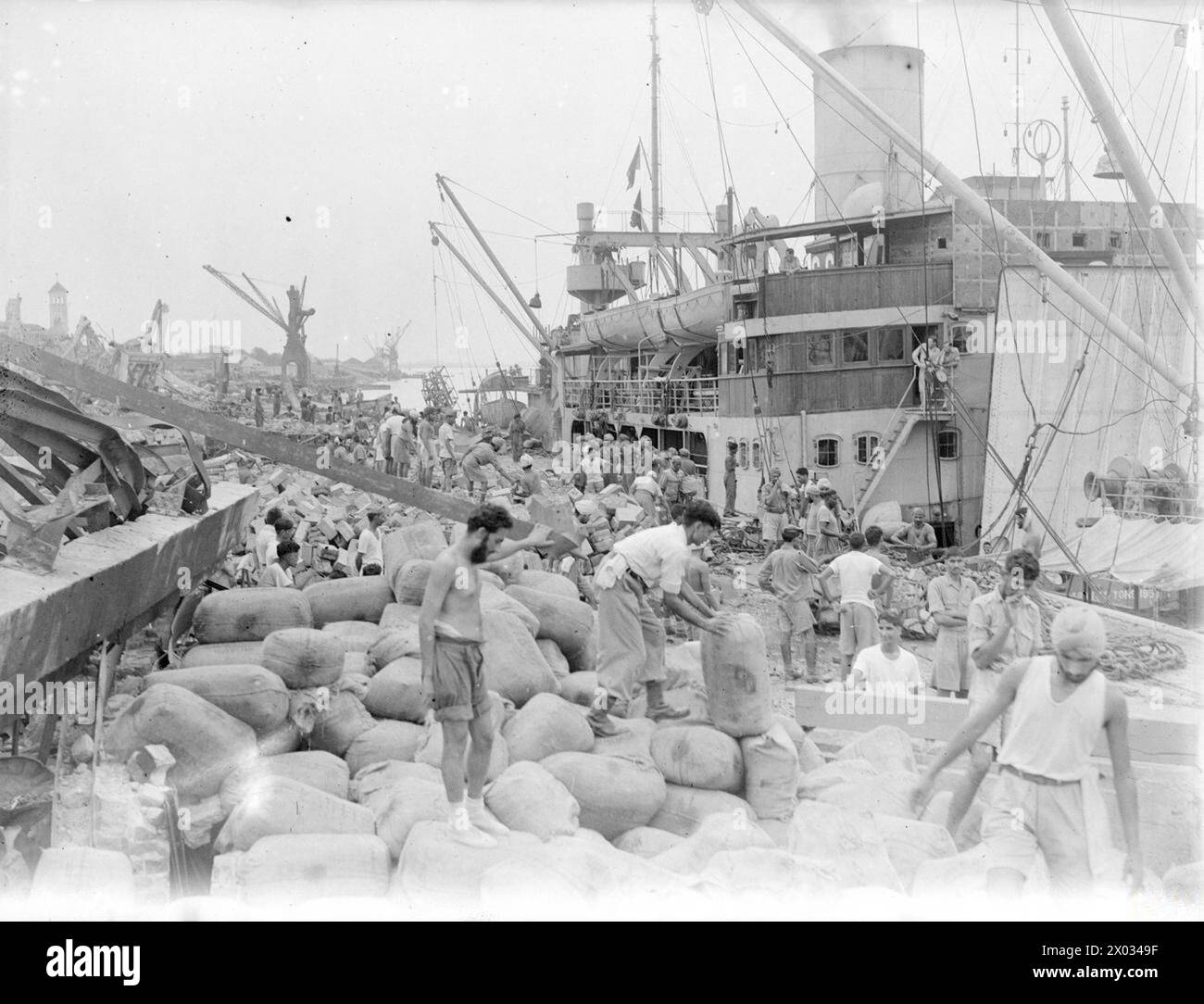 RANGOON PORT OPEN TO SHIPPING. MAY 1945, DURING THE EARLY DAYS OF ...