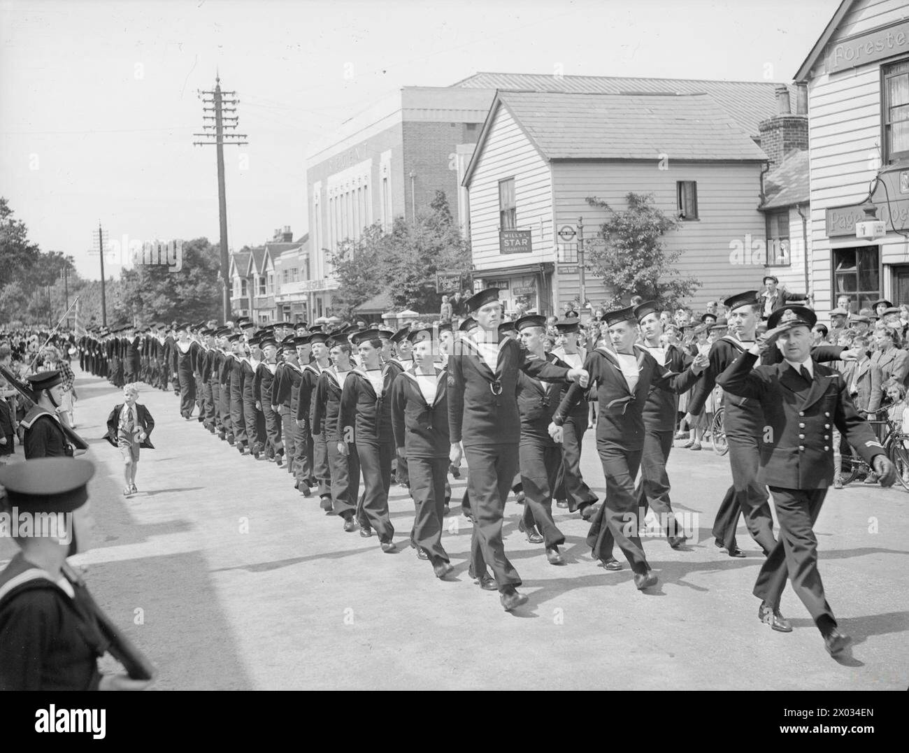 REAR ADMIRAL INSPECTS SEA CADETS. 3 JUNE 1945, HORLEY, SURREY. THE ...