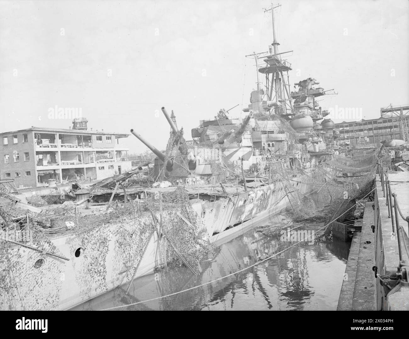 BOMB-DAMAGED SHIPPING AT KIEL. MAY 1945, AT THE GERMAN NAVAL BASE ...