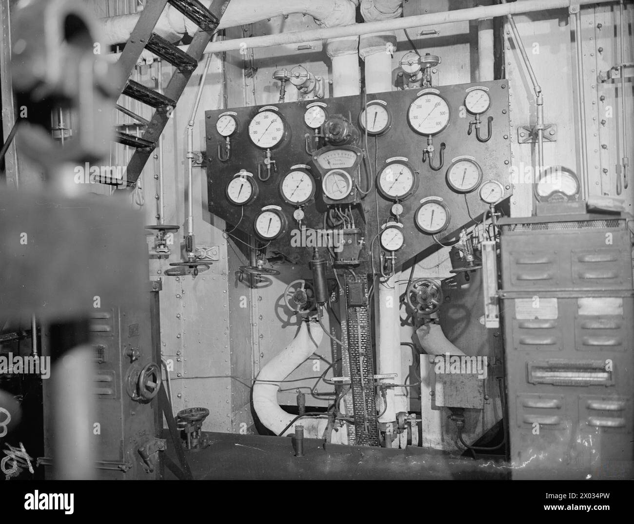 The engine room of SS Empire Chieftain, a fast cargo ship, shows the ...