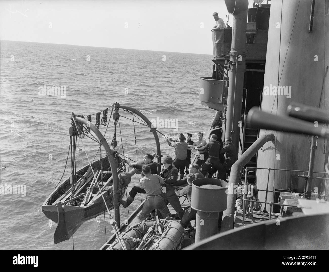 Crew members of HM Trawler Northern Sky operate on the Northern Patrol ...
