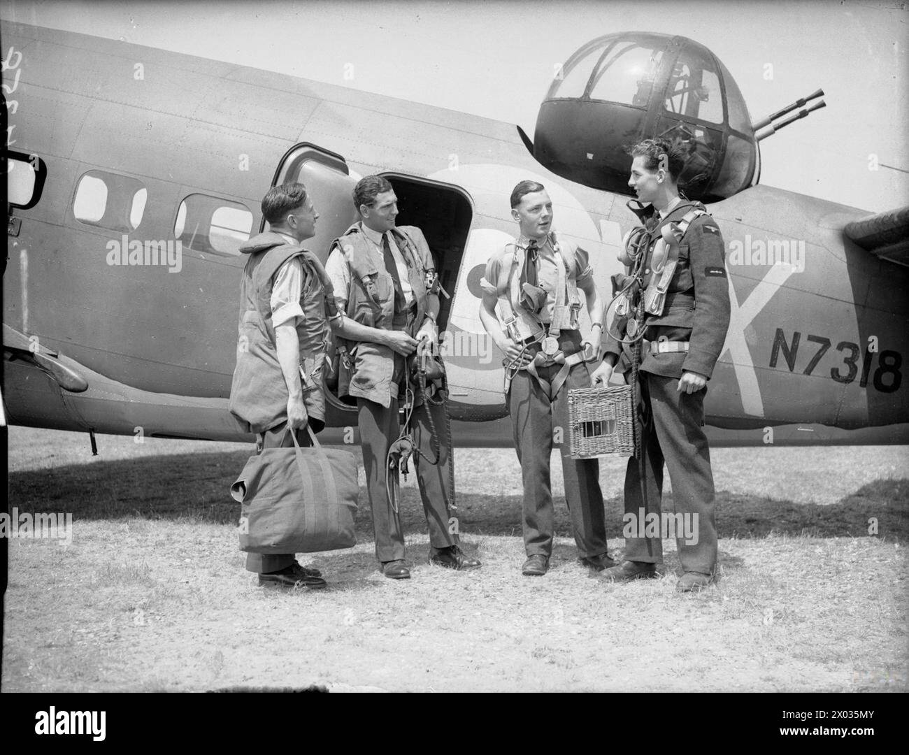 Crew of Lockheed Hudson Mark I, N7318, No. 206 Squadron RAF, gather at ...
