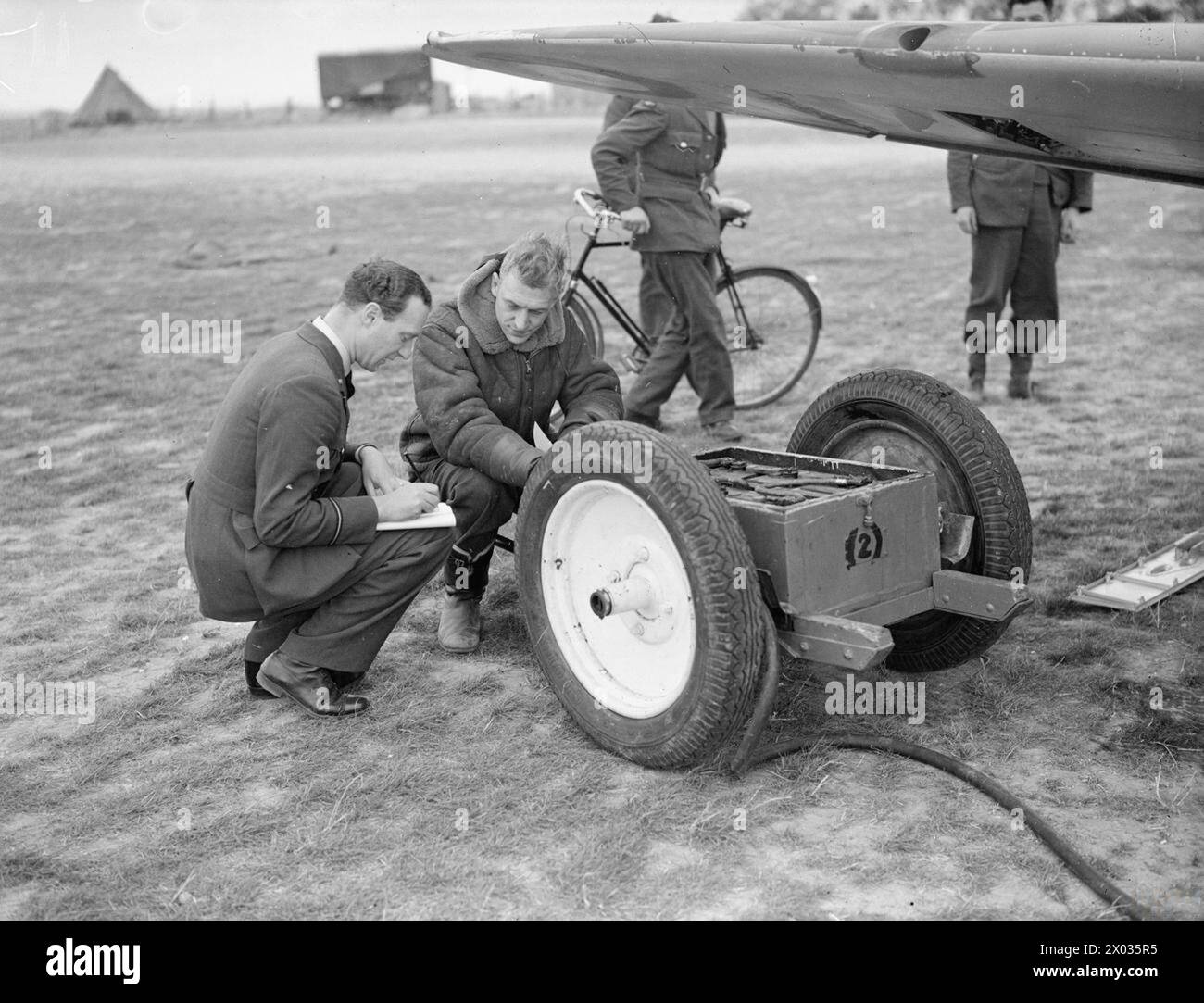 Sergeant Bernard 'Jimmy' Jennings of No. 19 Squadron RAF rests on a ...