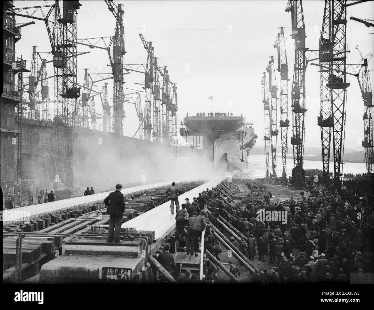 THE LAUNCHING OF THE AIRCRAFT CARRIER HMS INDEFATIGABLE AT GLASGOW ...
