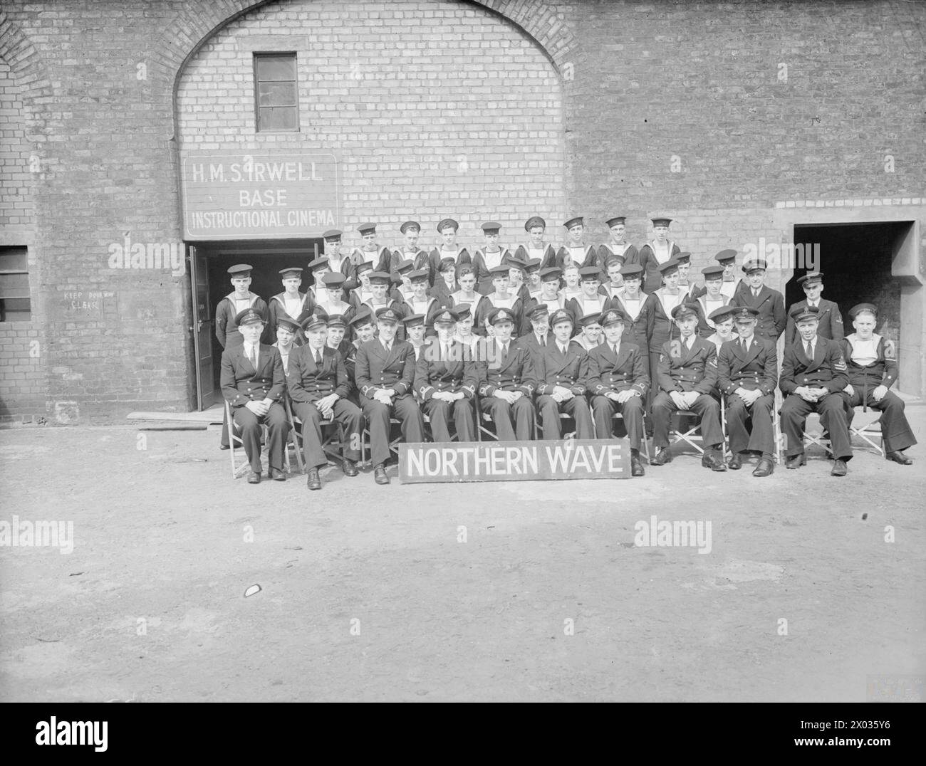Crew members of the Royal Navy trawler HMS Northern Wave photographed ...
